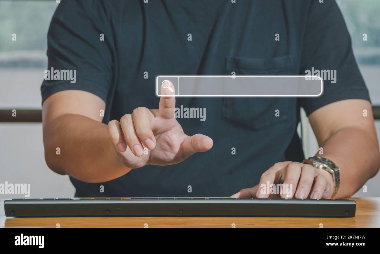 Hand of man touching searching browsing icon for internet data ...