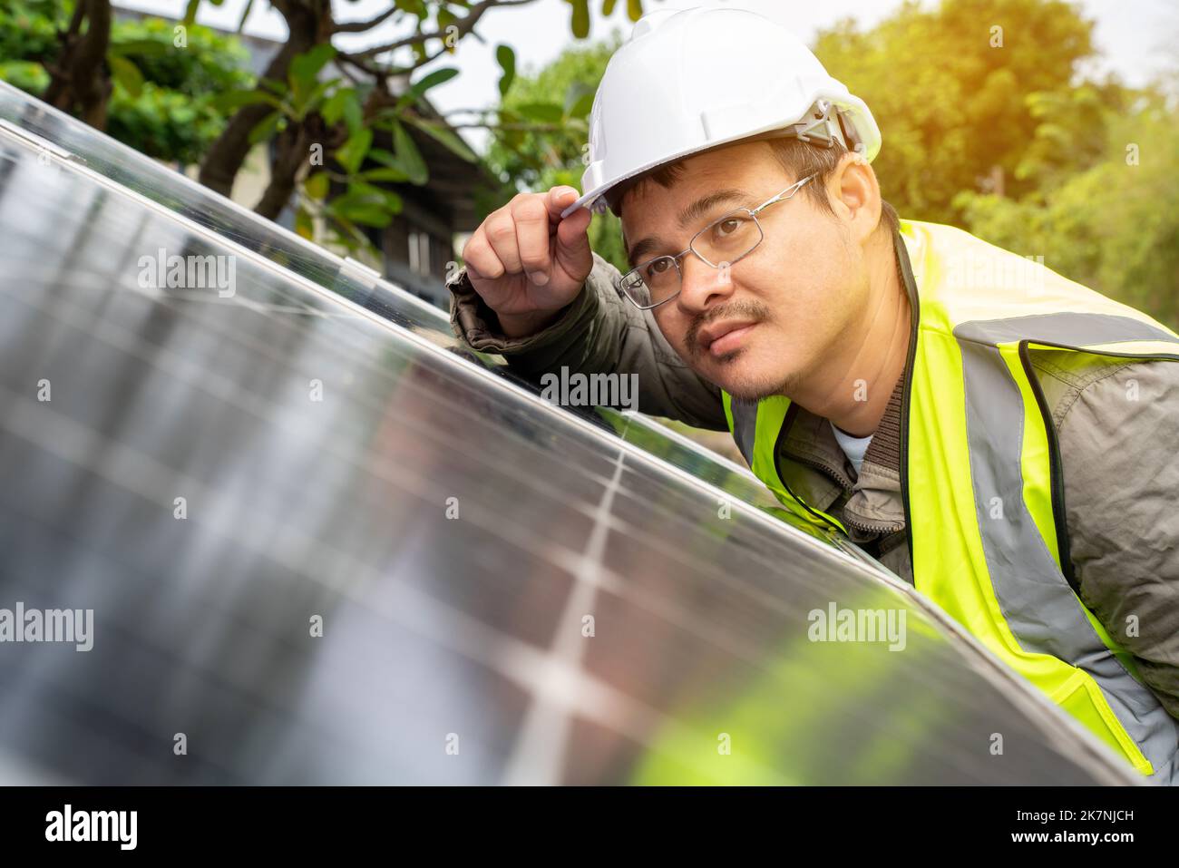 Blue Solar Photo voltaic panels system of apartment building on sunny ...