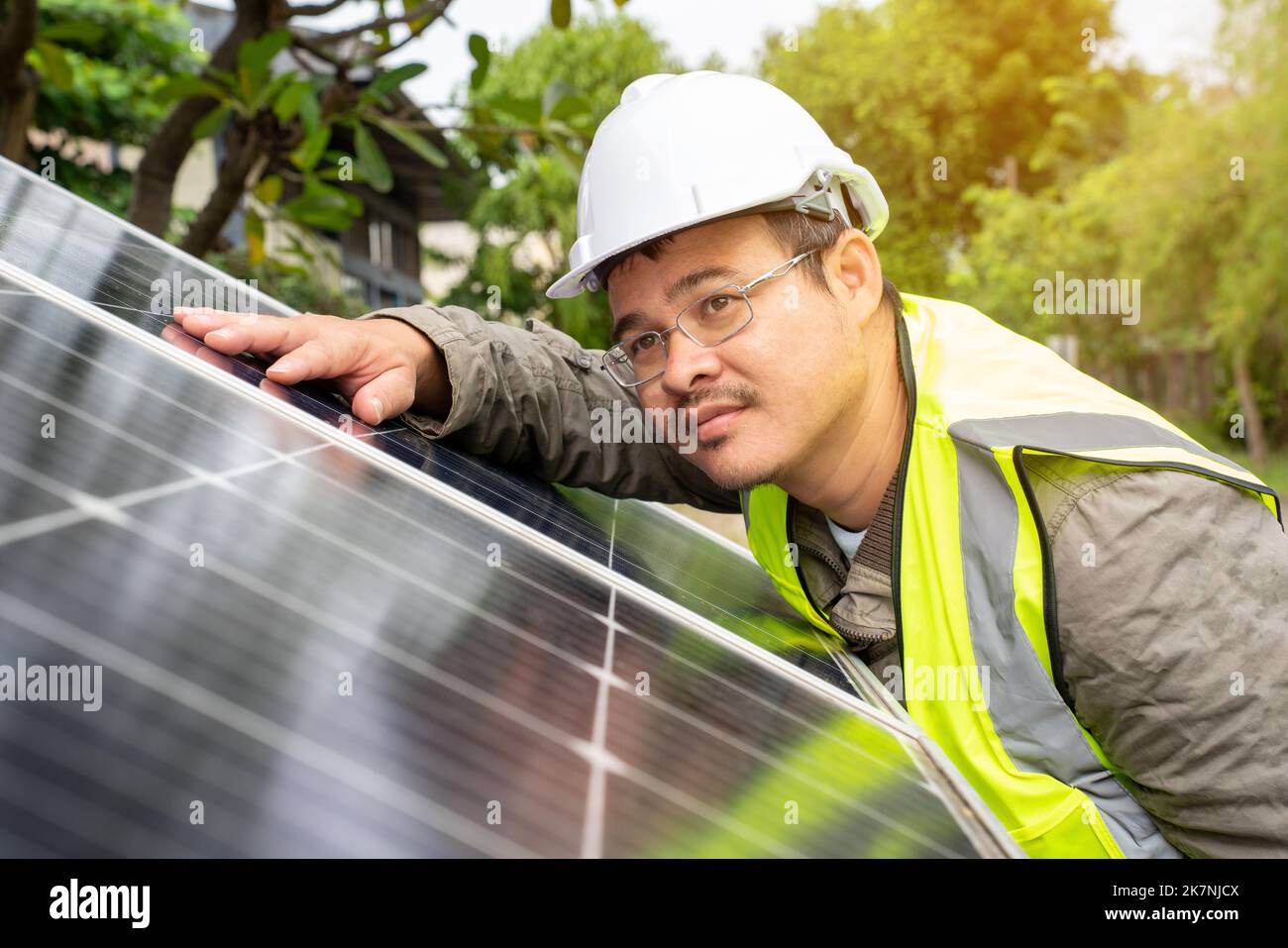Blue Solar Photo voltaic panels system of apartment building on sunny ...