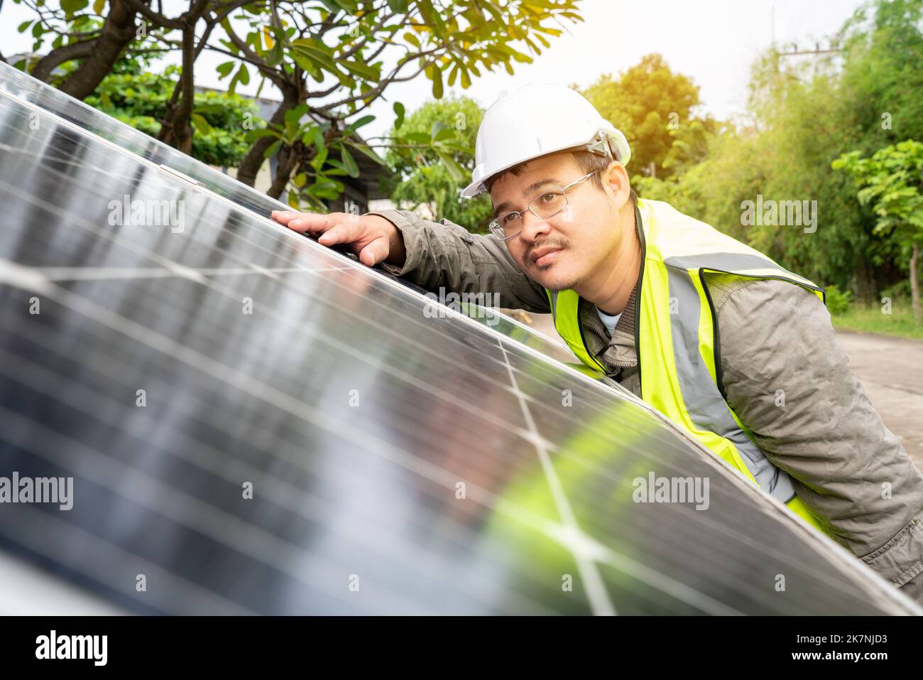 Blue Solar Photo voltaic panels system of apartment building on sunny ...