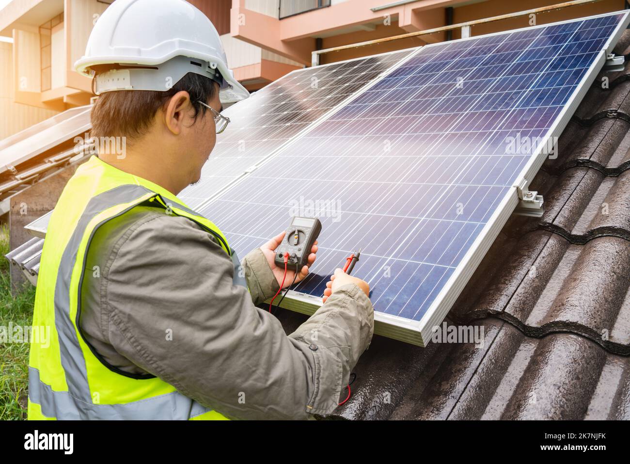 Blue Solar Photo voltaic panels system of apartment building on sunny ...