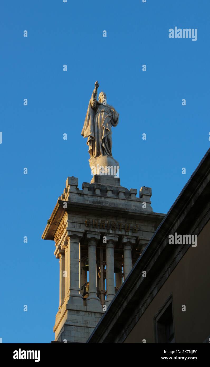 Bell tower with a statue of Jesus Christ Basílica-Santuario del Sagrado ...