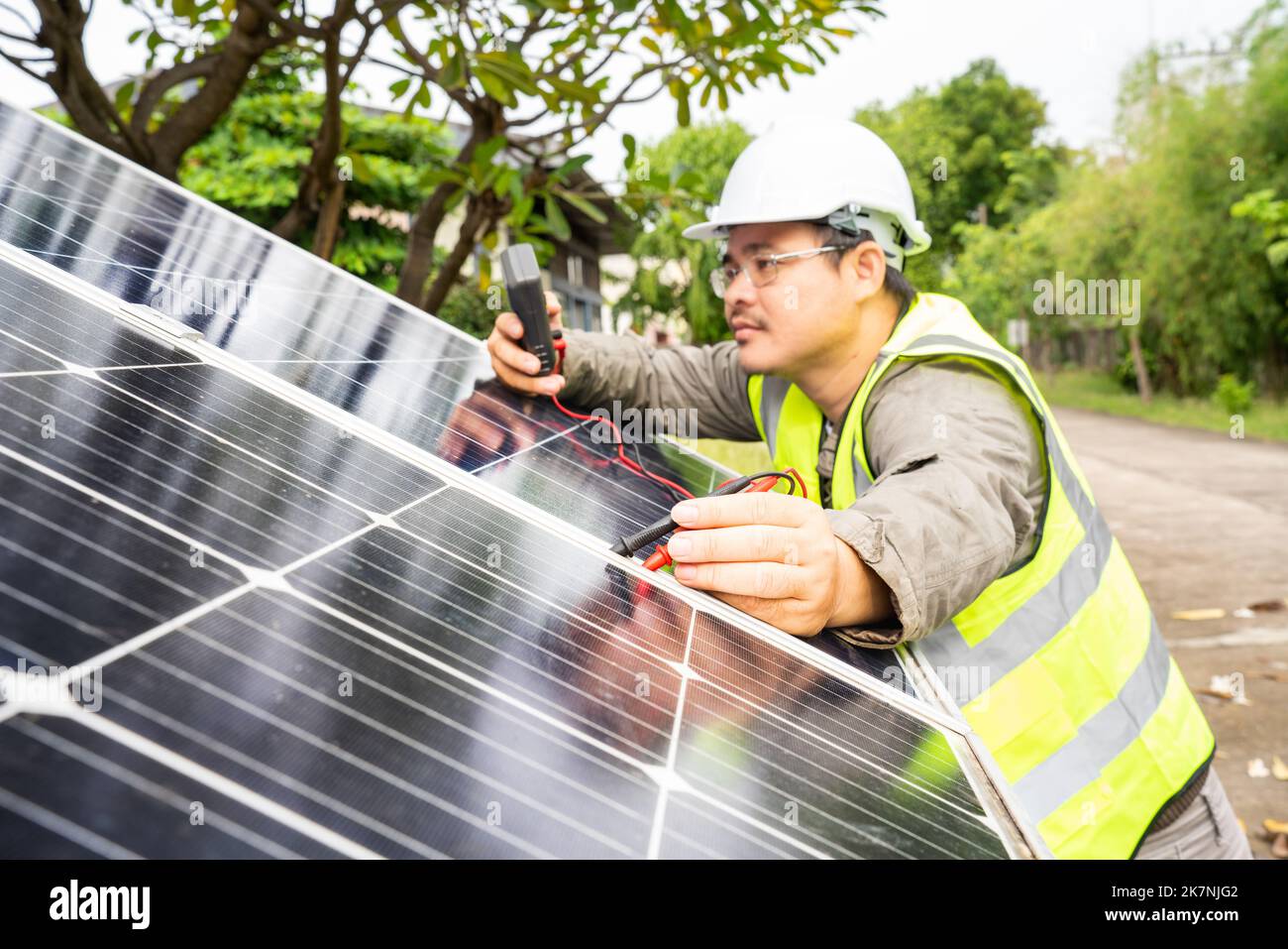 Blue Solar Photo voltaic panels system of apartment building on sunny ...