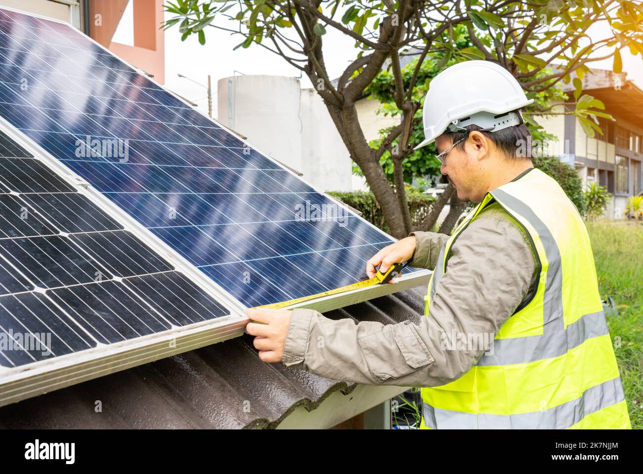 Blue Solar Photo voltaic panels system of apartment building on sunny ...