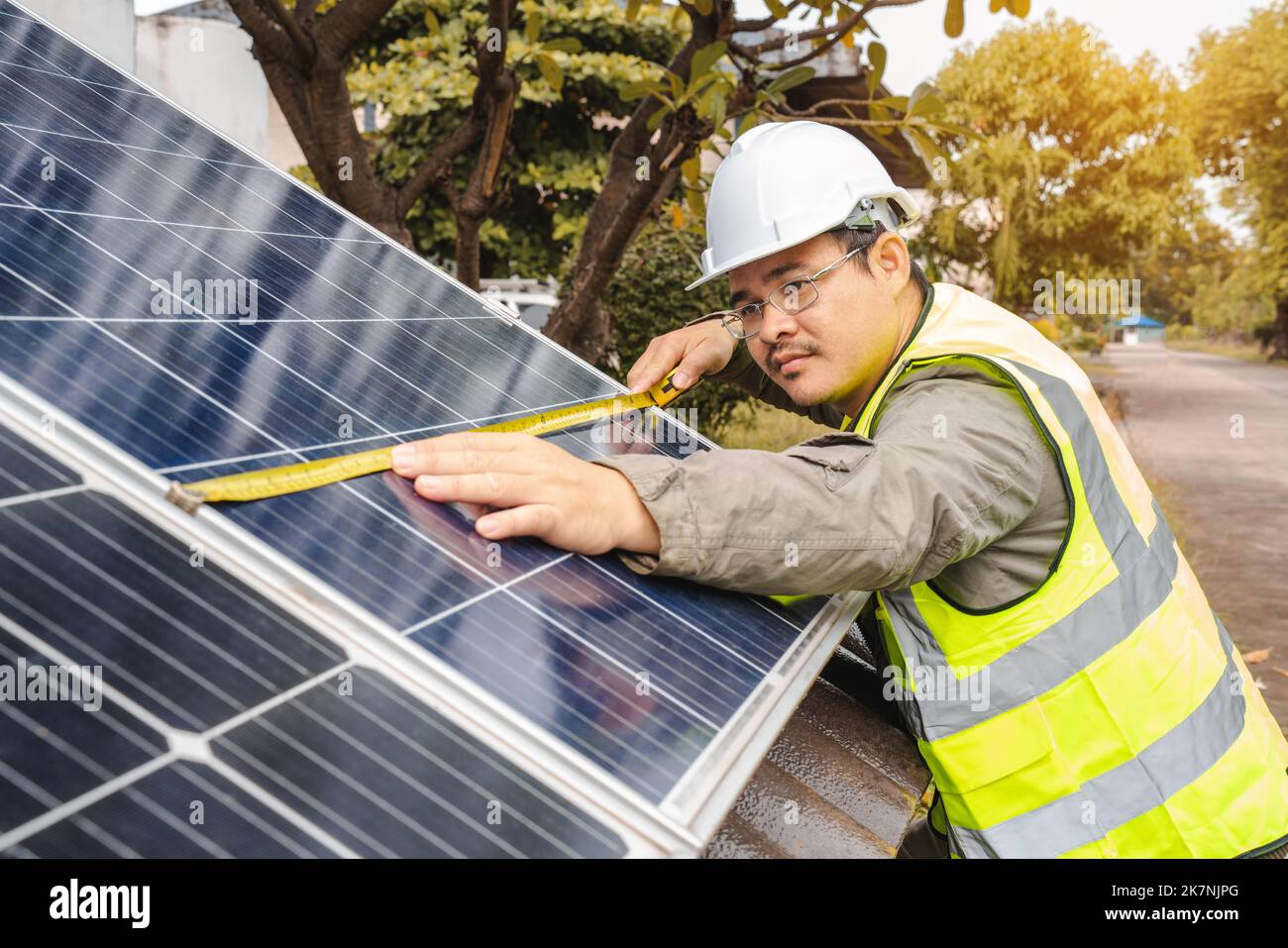 Blue Solar Photo voltaic panels system of apartment building on sunny ...