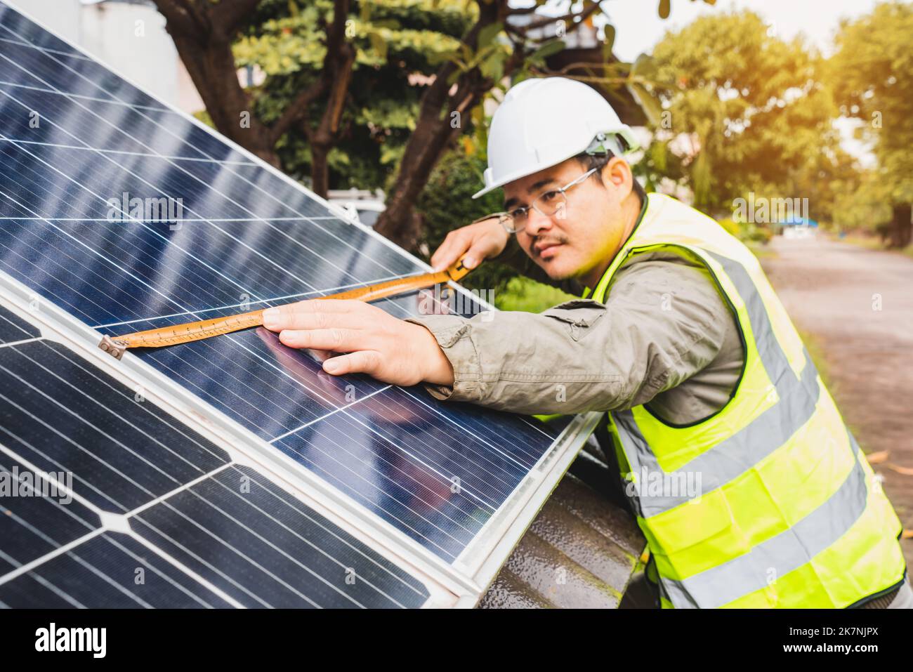 Blue Solar Photo voltaic panels system of apartment building on sunny ...