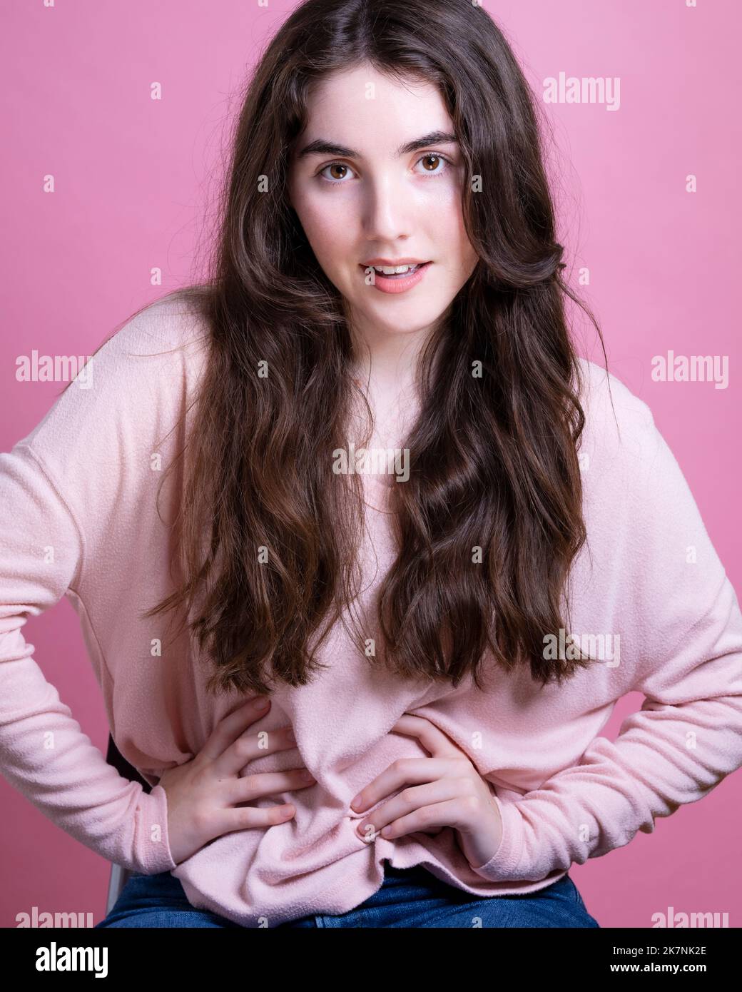 Pink on Pink Theme | Portrait of a Young Woman in Pink Stock Photo - Alamy