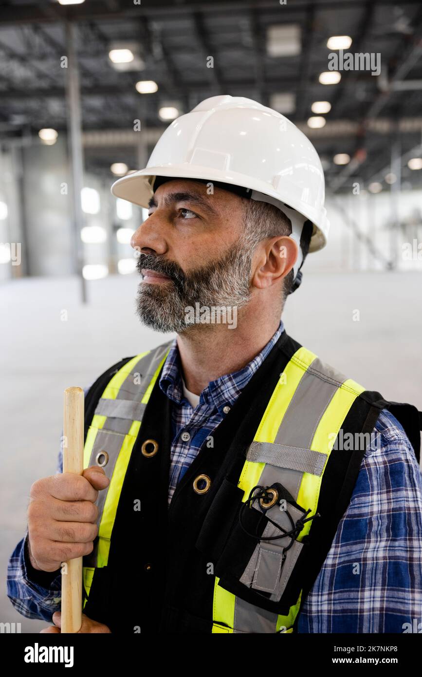 Man with hard hat hi-res stock photography and images - Alamy