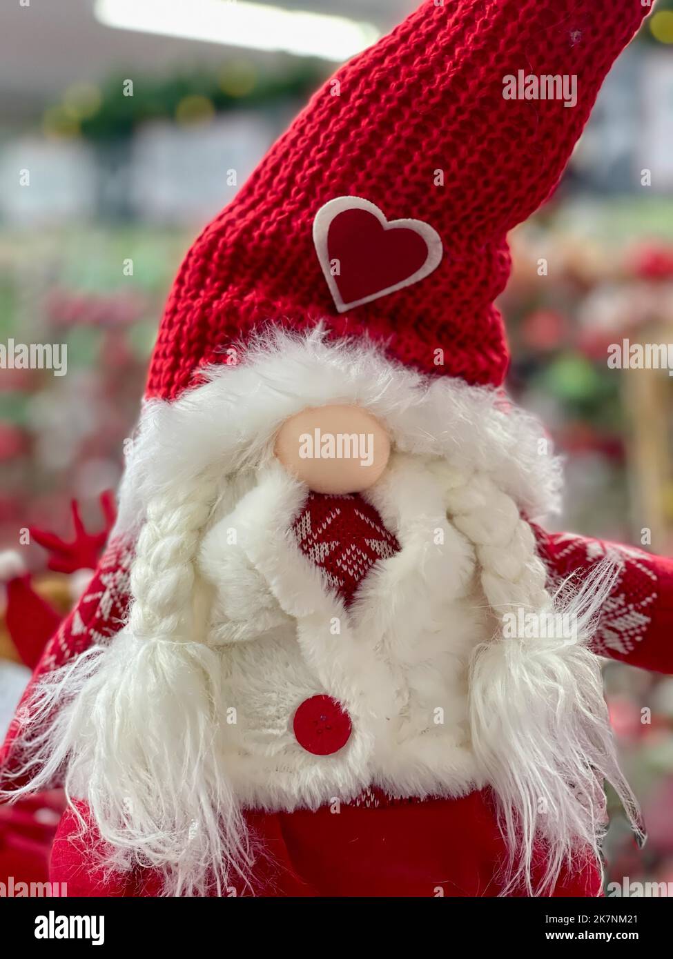 Christmas Gonk with a red santa hat portrait crop with blurred bokeh ...