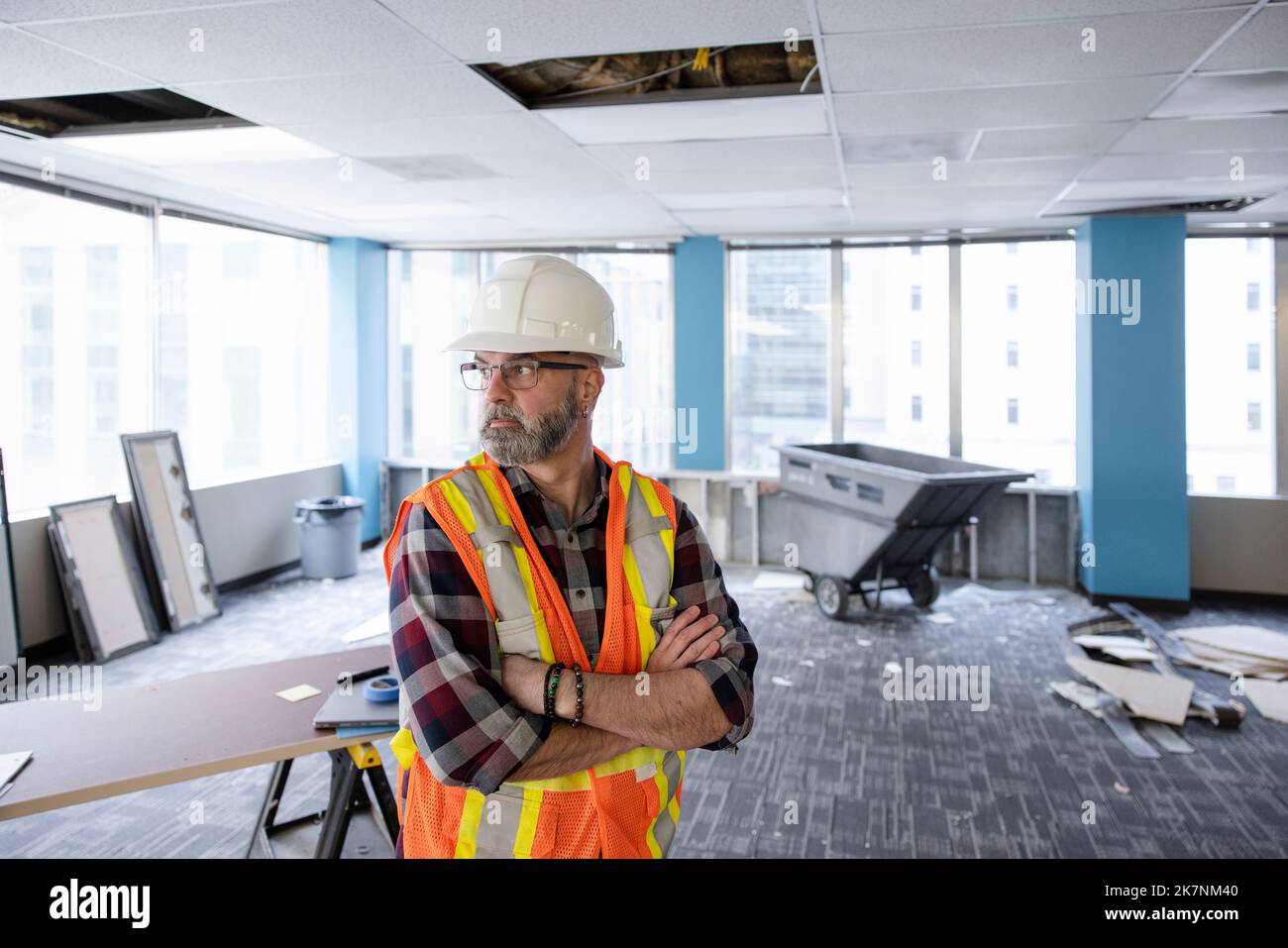 Construction foreman on site of office renovation Stock Photo - Alamy