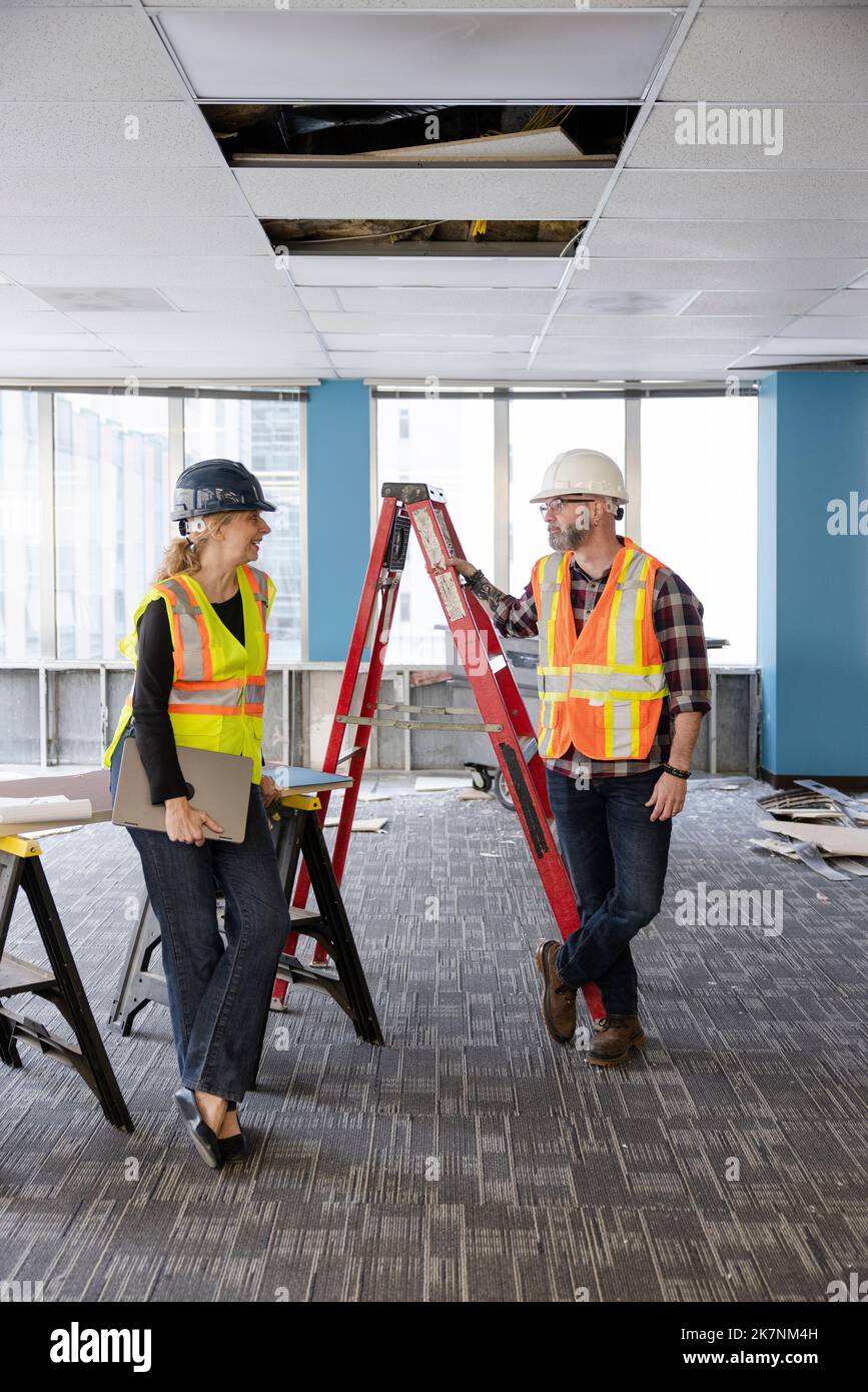 Construction Workers Working Inside