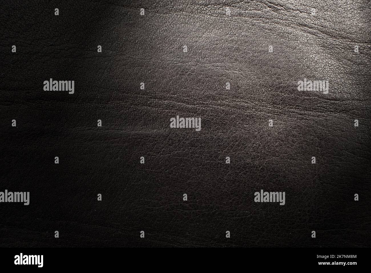 Black leather texture. Abstract background of dark leather with small ...