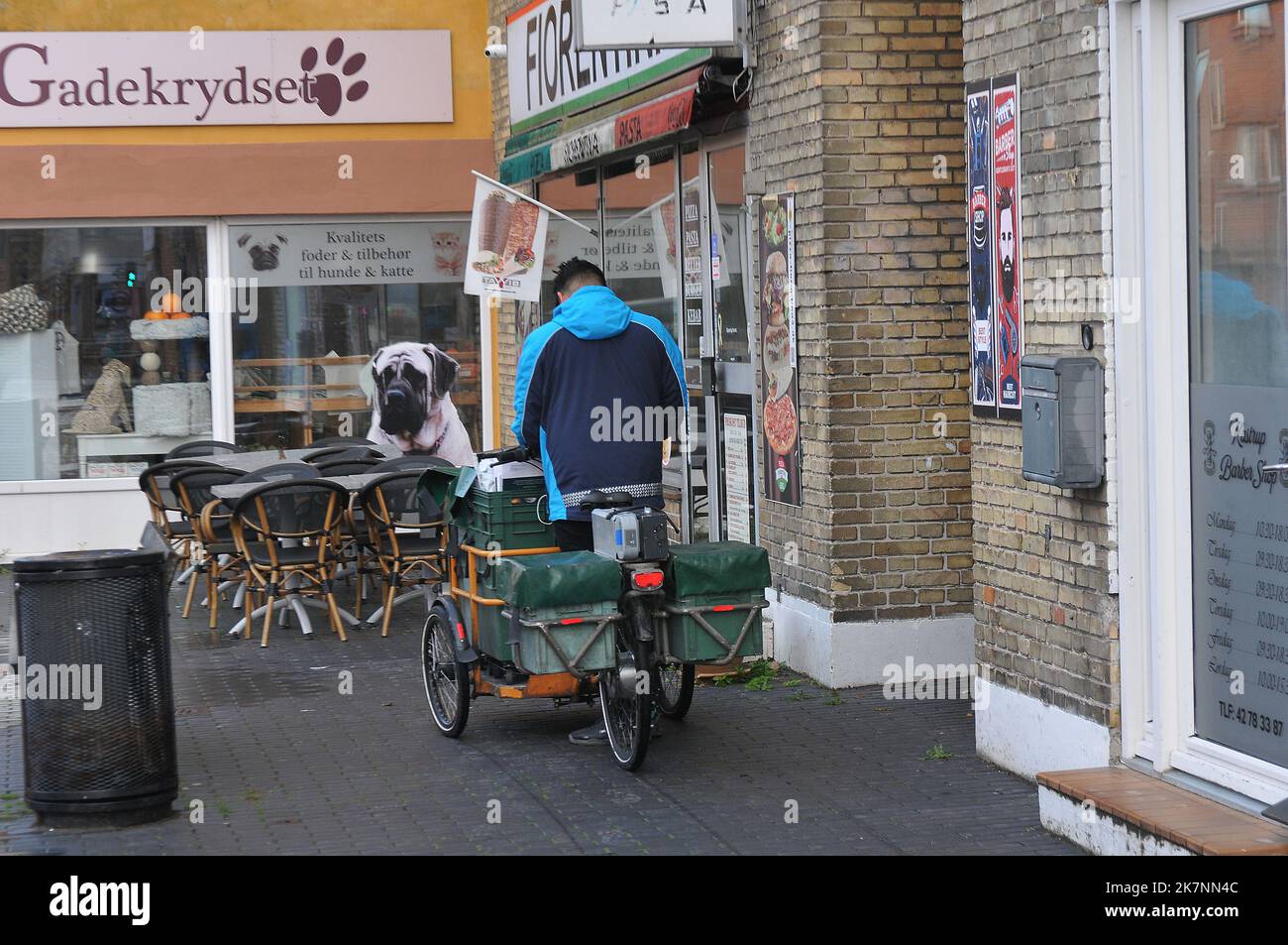 Copenahgen /Denmark/18 OIctober 2022/Mail man delivers mail in Kastrup ...