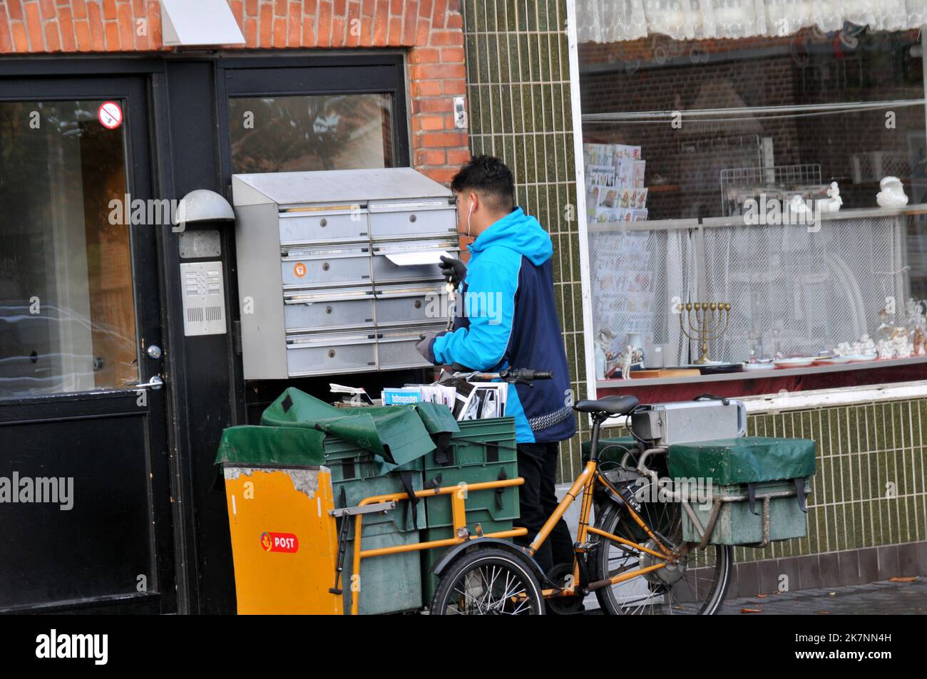 Copenahgen /Denmark/18 OIctober 2022/Mail man delivers mail in Kastrup ...