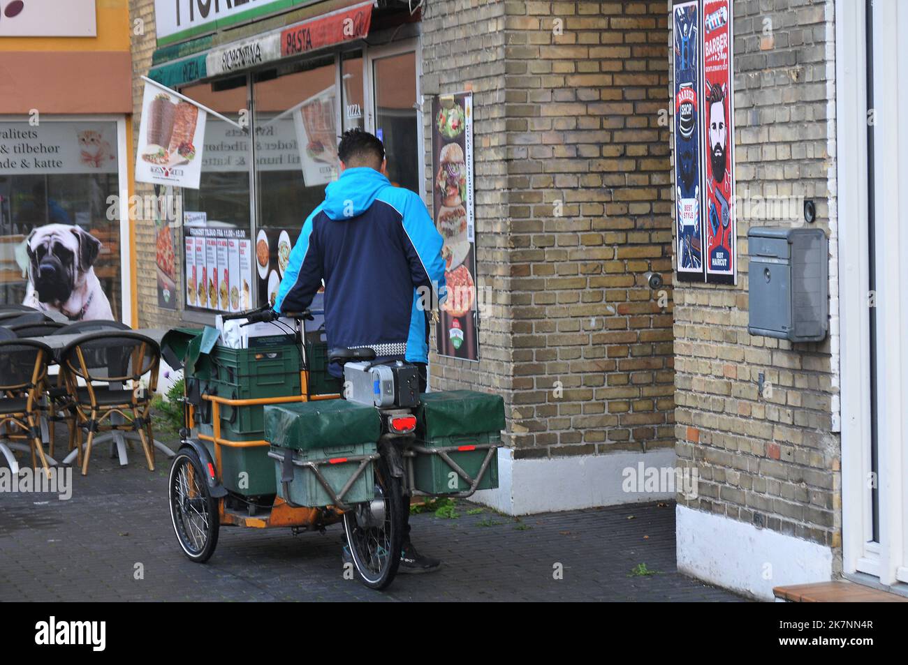 Copenahgen /Denmark/18 OIctober 2022/Mail man delivers mail in Kastrup ...