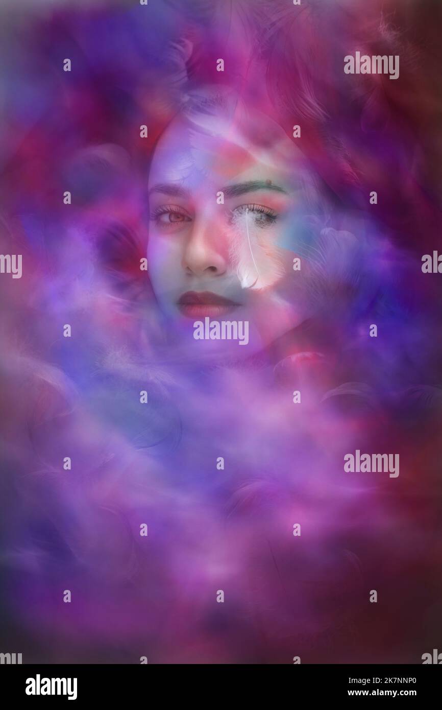 A beautiful woman with an inspiring look, seems to feel the bright ...