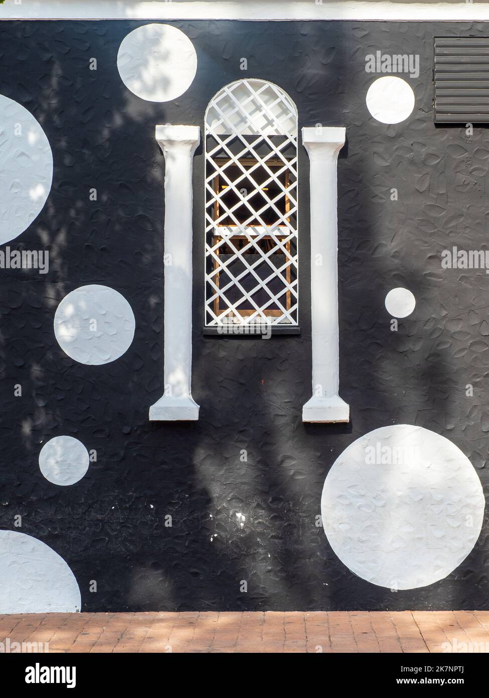 Andalusian style façade with black and white colours Stock Photo - Alamy