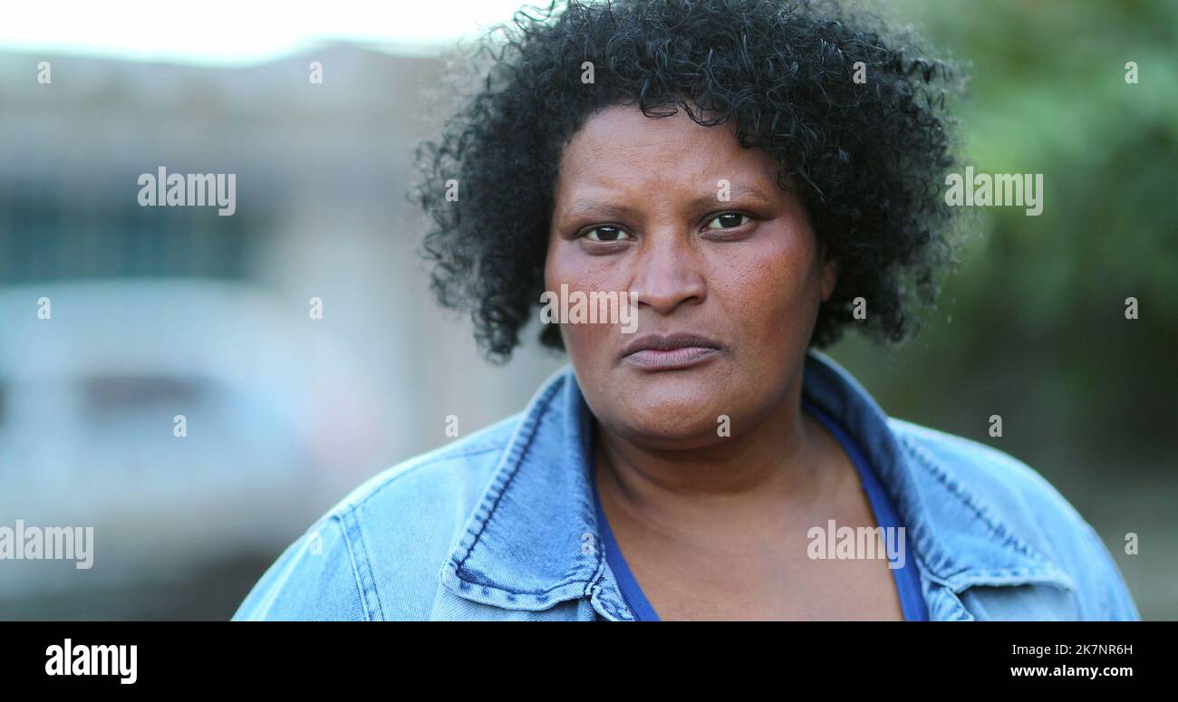 African woman close-up face, hispanic Brazilian ethnicity, serious ...