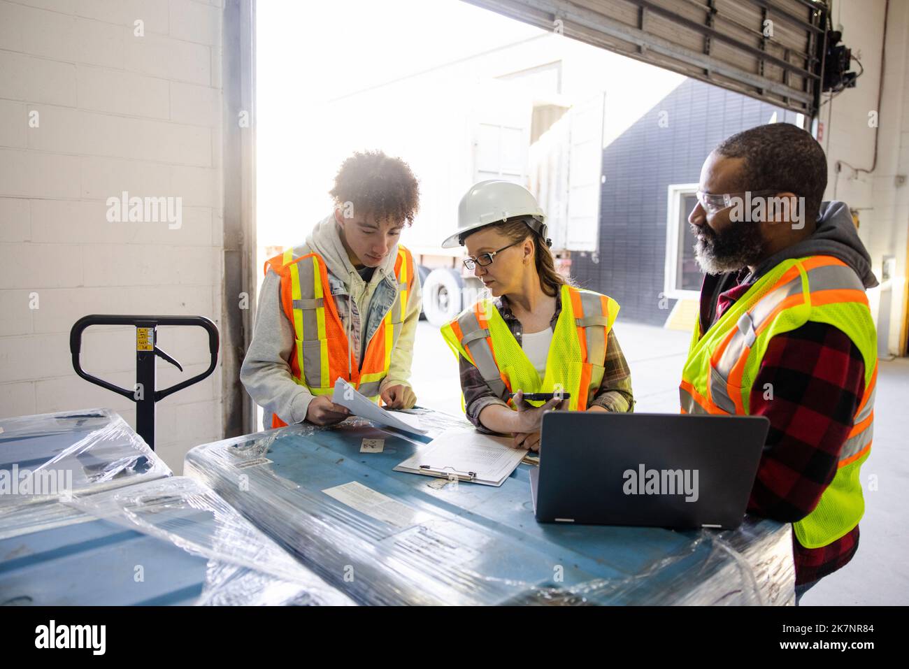 Warehouse manager holding clipboard using hi-res stock photography and ...