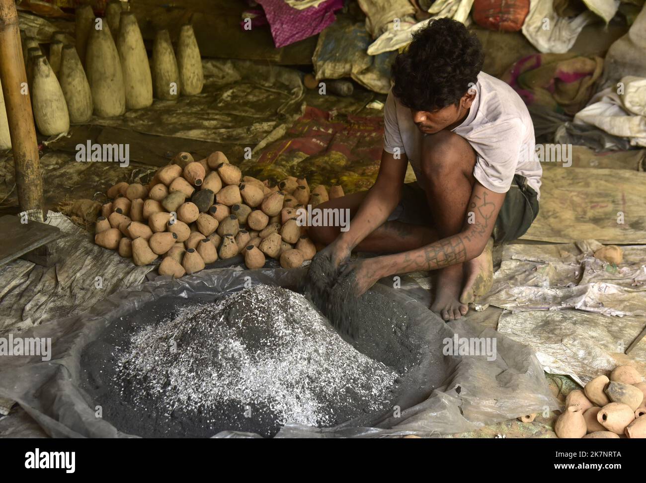 Guwahati, Guwahati, India. 17th Oct, 2022. Worker preparing fire ...