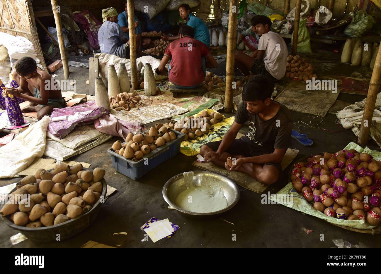 Guwahati, Guwahati, India. 17th Oct, 2022. Worker preparing fire ...