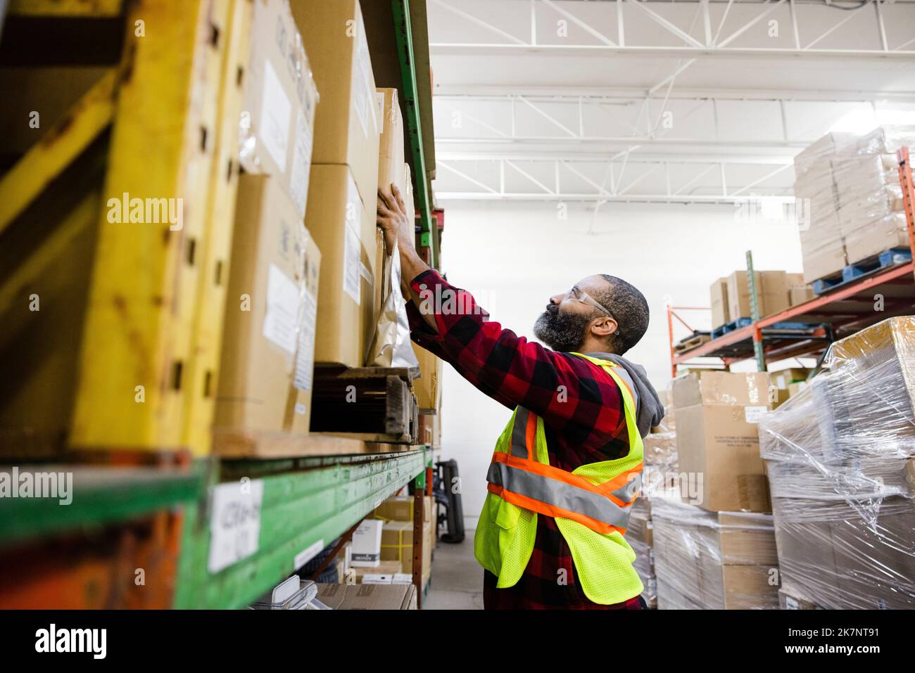Man reaching into box hi-res stock photography and images - Alamy