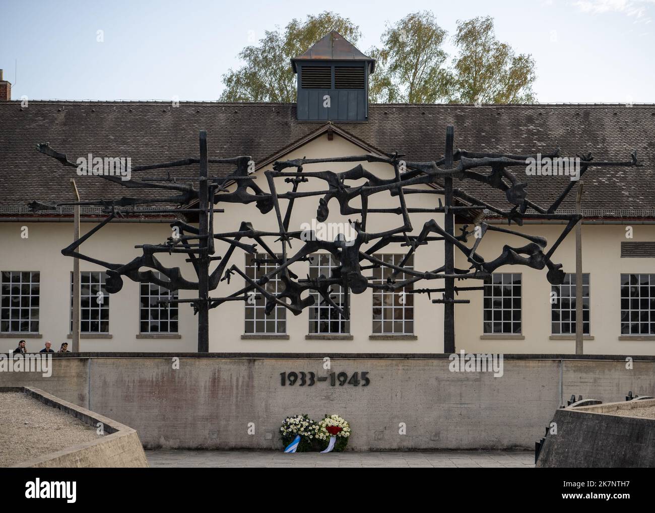 Dachau, Germany. 18th Oct, 2022. The bronze sculpture "People in the ...
