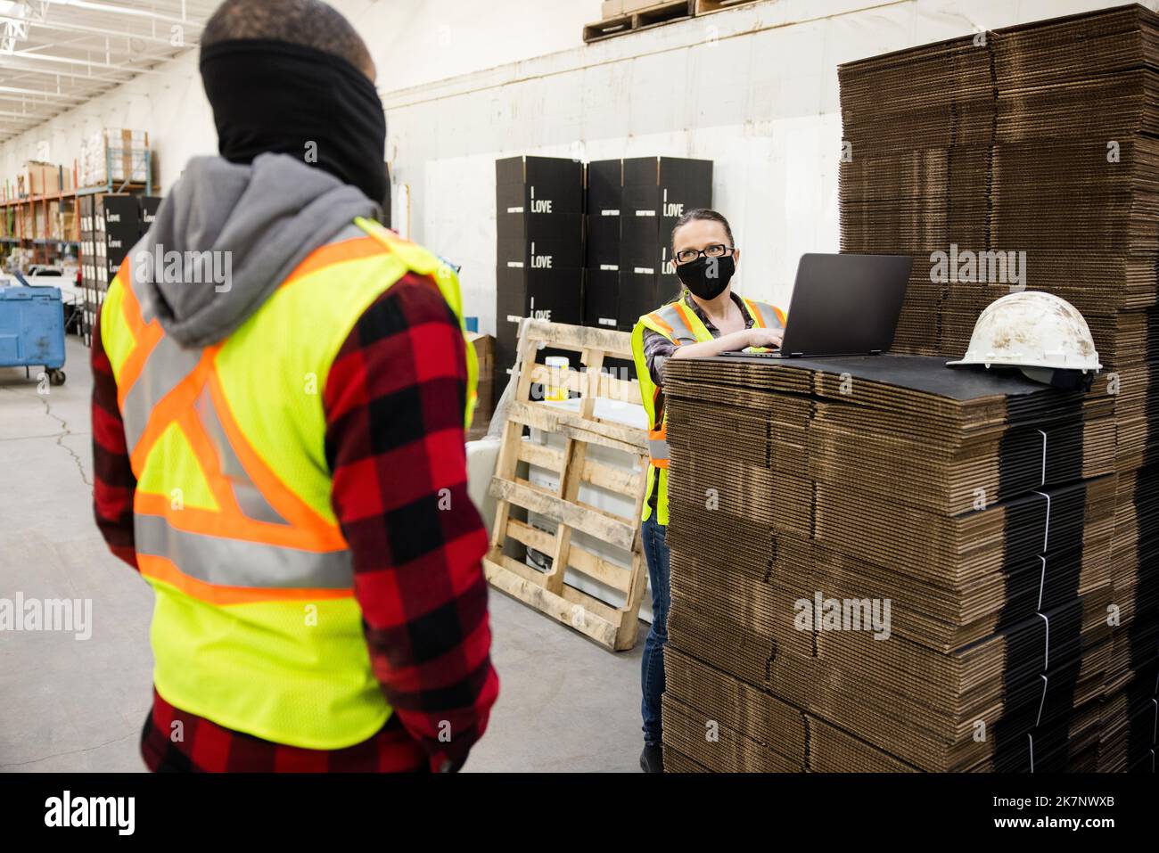 Talking in masks hi-res stock photography and images - Alamy