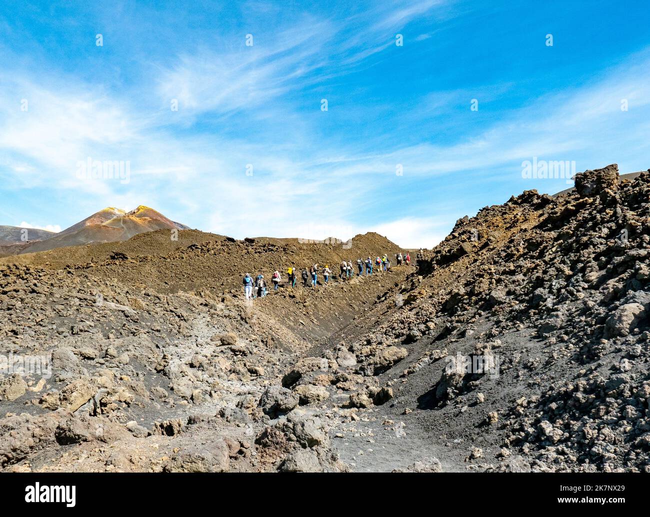 Sicily, Italy - September 26, 2022: people climbing the volcano Etna in ...