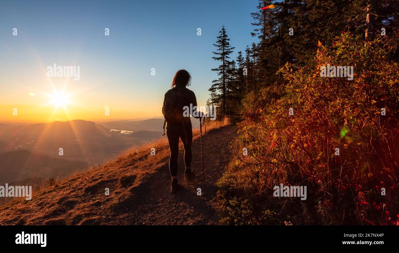 Adventurous Woman Hiking in Canadian Landscape with Fall Colors during ...
