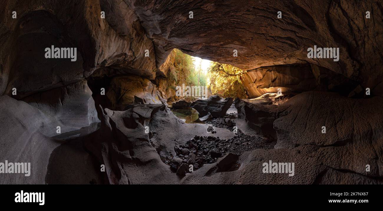 Cave and river in a canyon. Canadian Nature Background. Panorama Stock ...