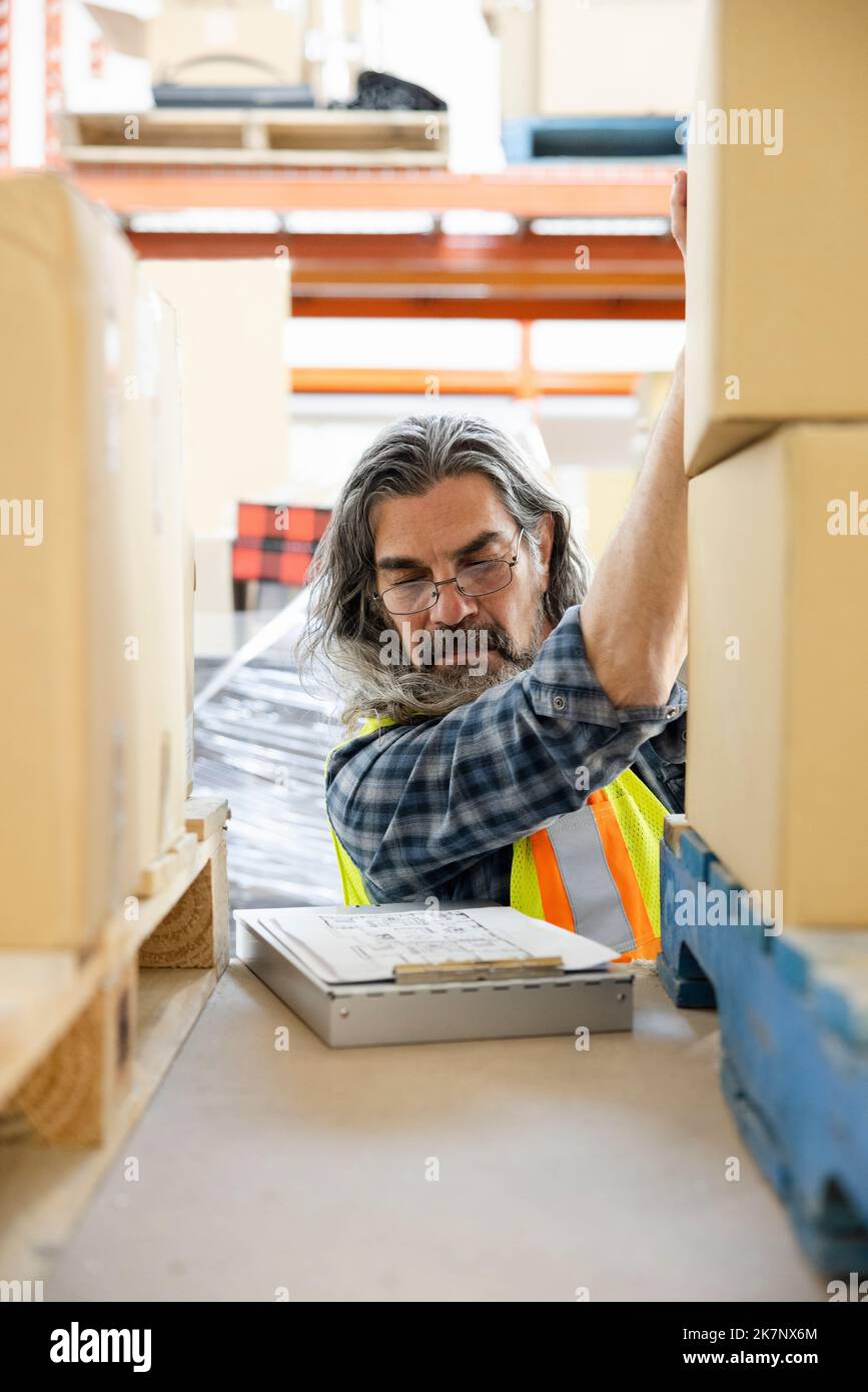 Man pulling at collar hi-res stock photography and images - Alamy