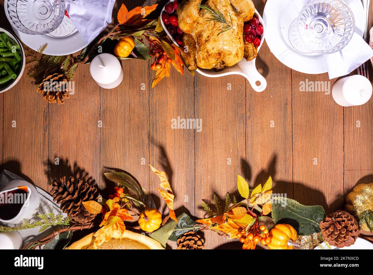 Thanksgiving family party dinner table setting with plates, cutlery ...