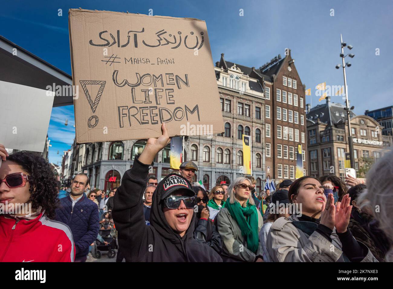 Amsterdam, Netherlands. 16th Oct, 2022. A woman holds up a placard ...