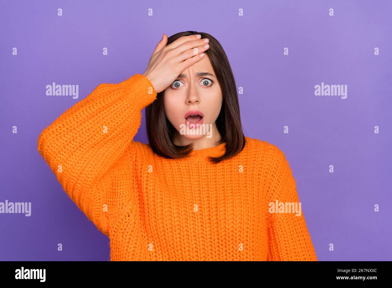 Photo of impressed speechless person arm touch head open mouth cant ...