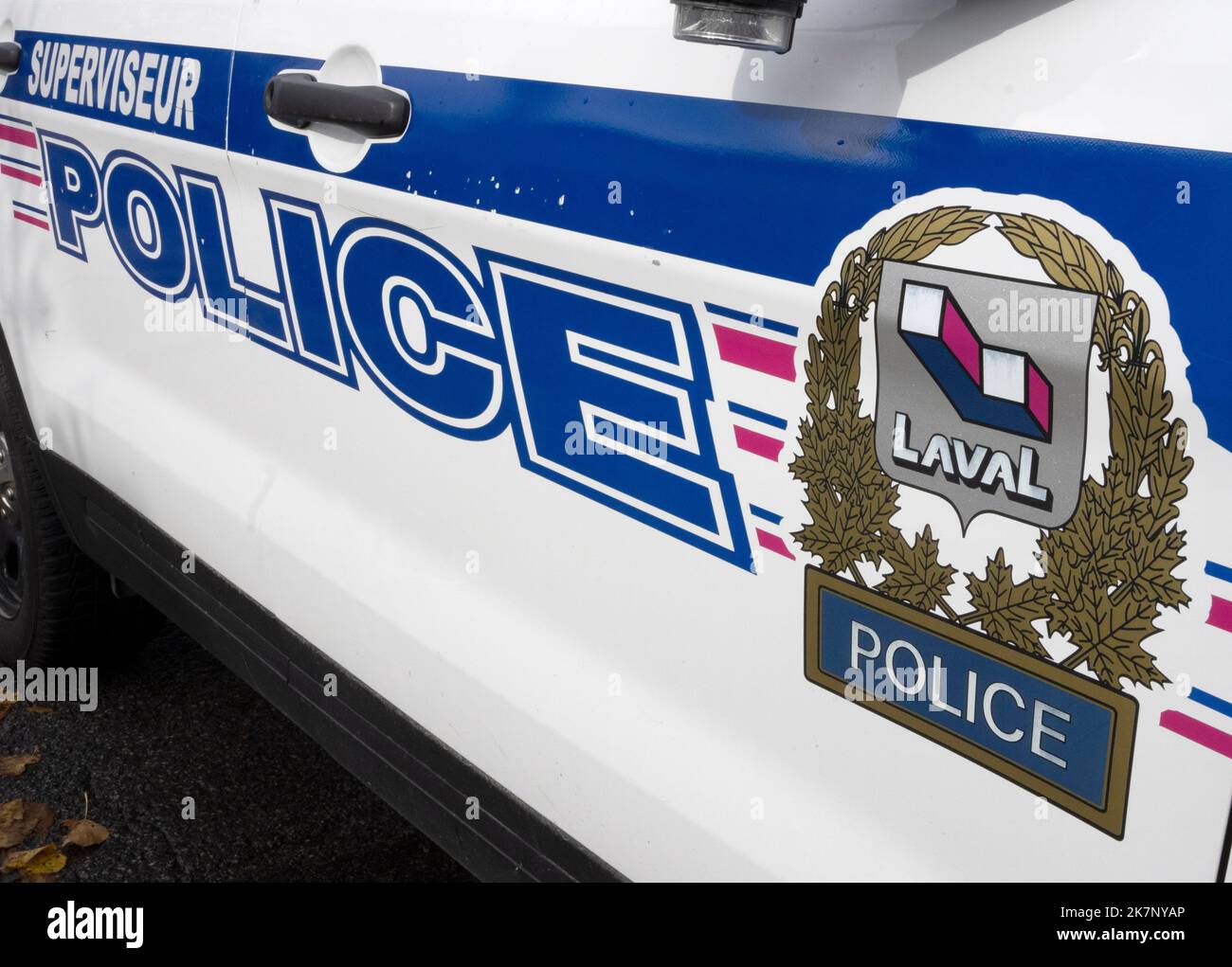 The Laval police logo is seen on a police car, Tuesday, October 18 ...