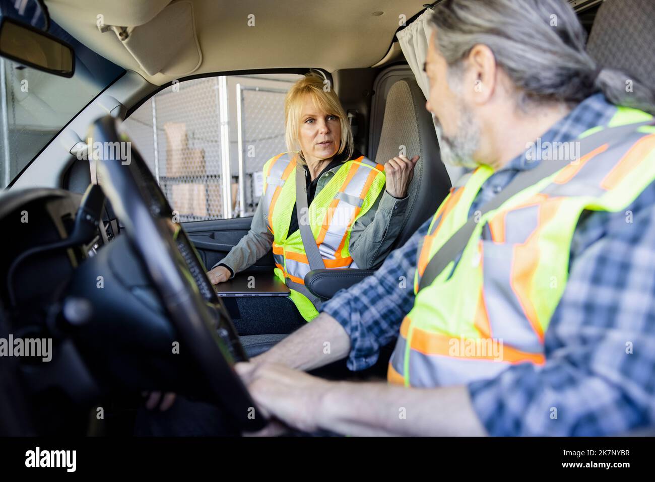 Two women talking to van driver hi-res stock photography and images - Alamy