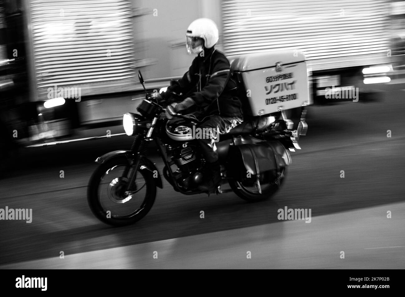 Tokyo, Japan. 18th Oct, 2022. A motorcycle delivery driver.Stock scenes ...