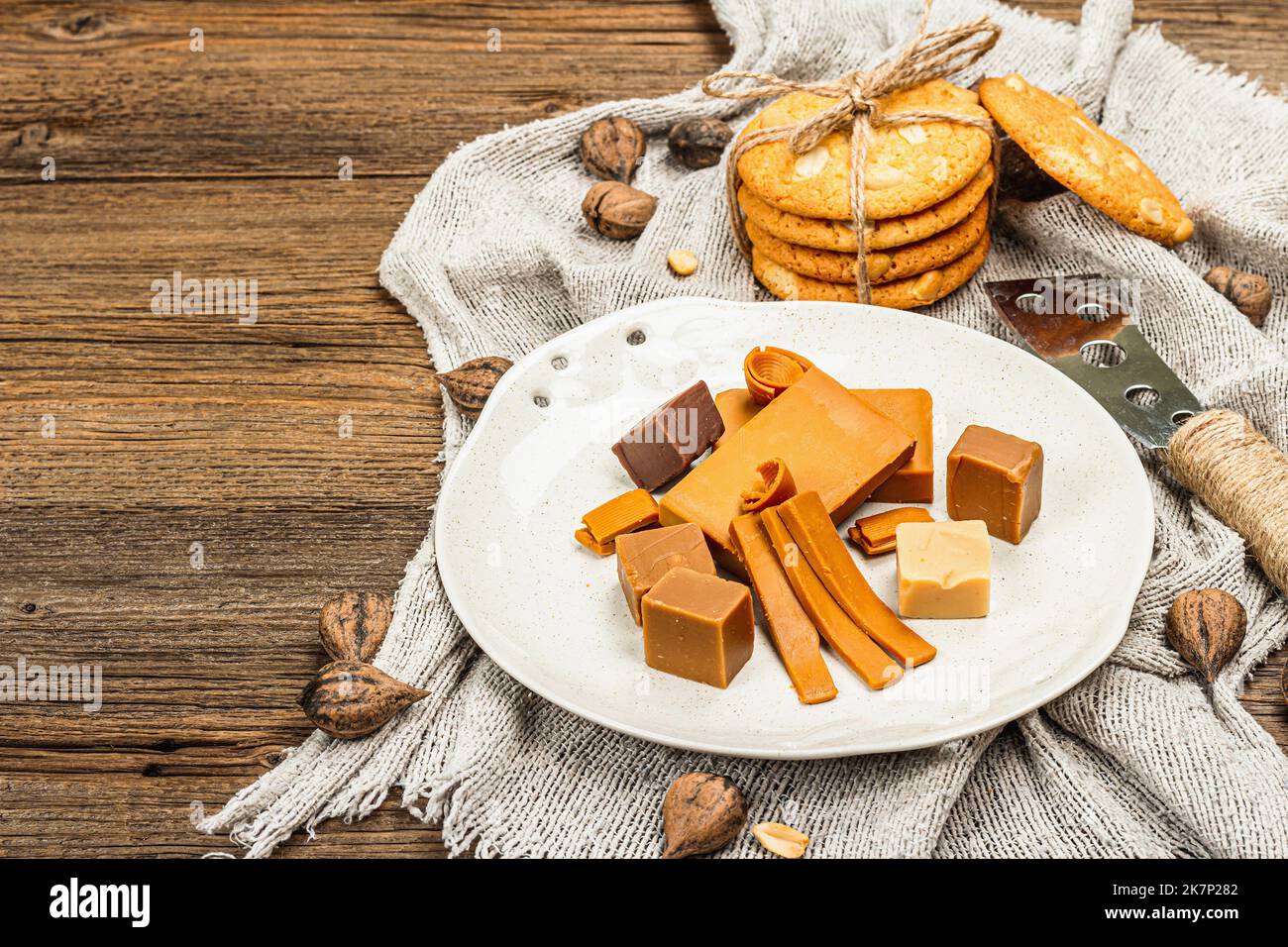 Norwegian brunost with cookies and nuts. Healthy food and eating ...