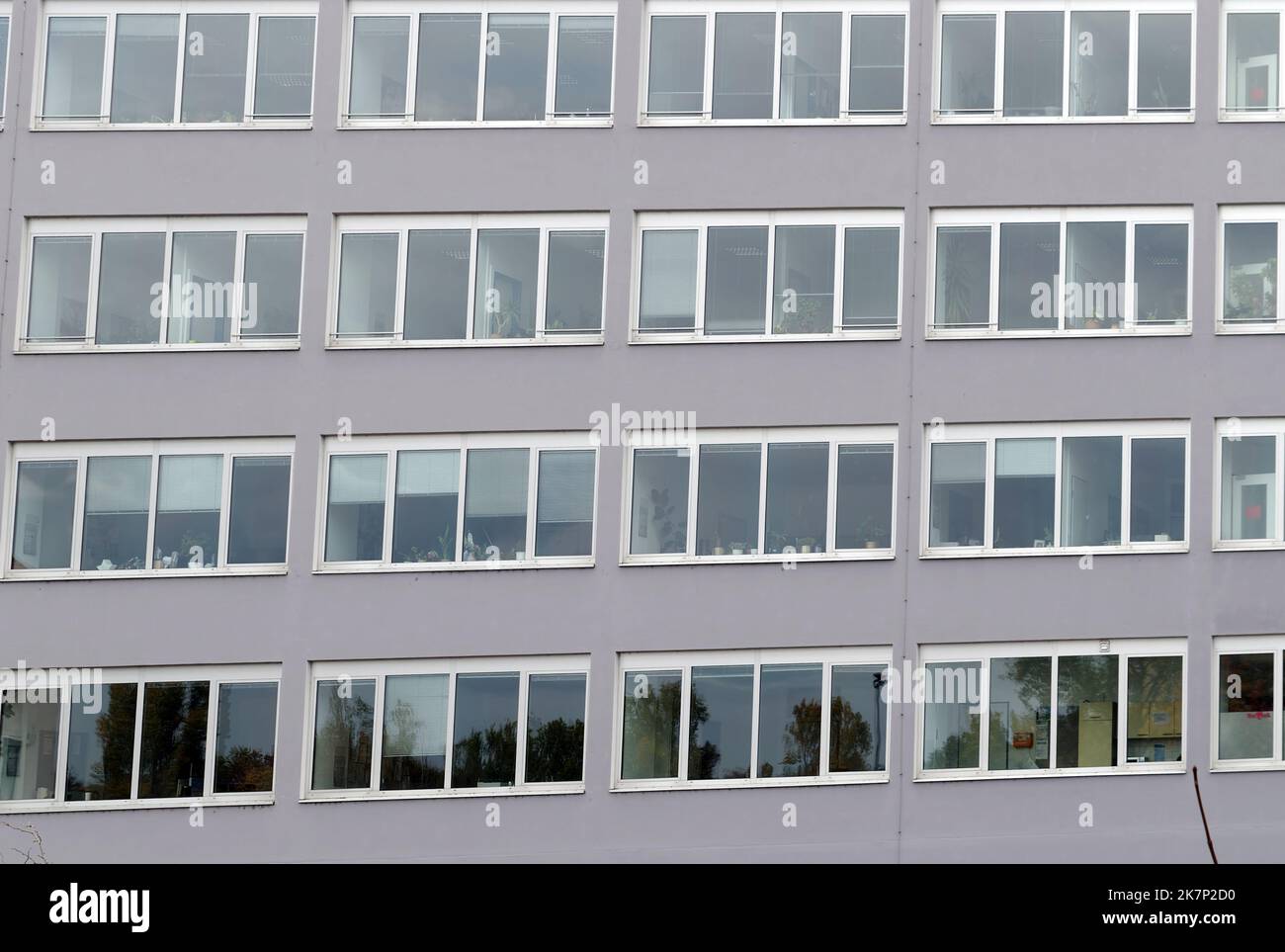 Background, perspective: facade with numerous windows Stock Photo - Alamy