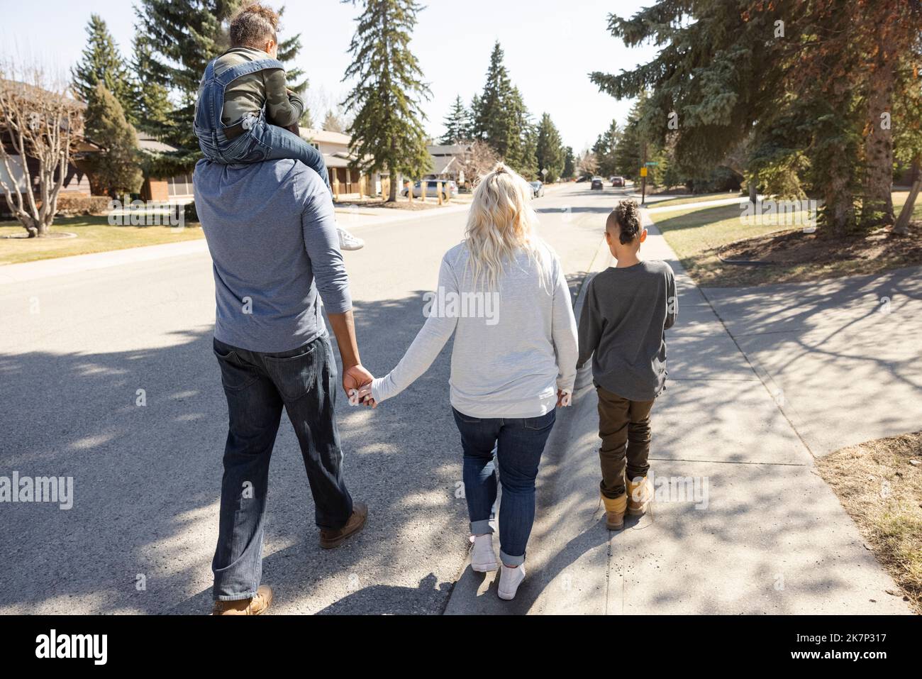 Mother father 3 children rear view hi-res stock photography and images ...