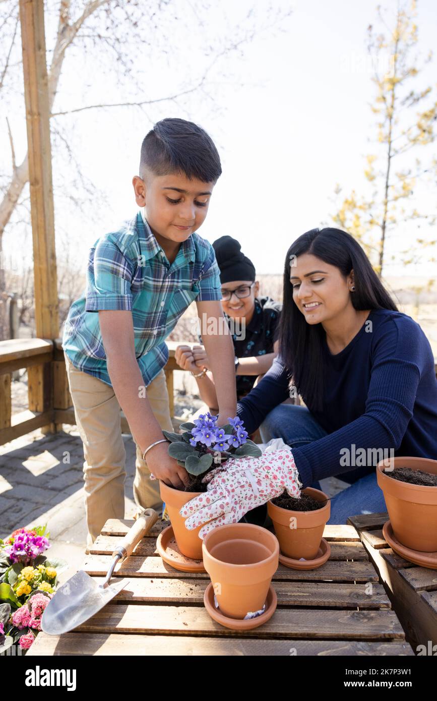 Boy with pot hi-res stock photography and images - Alamy