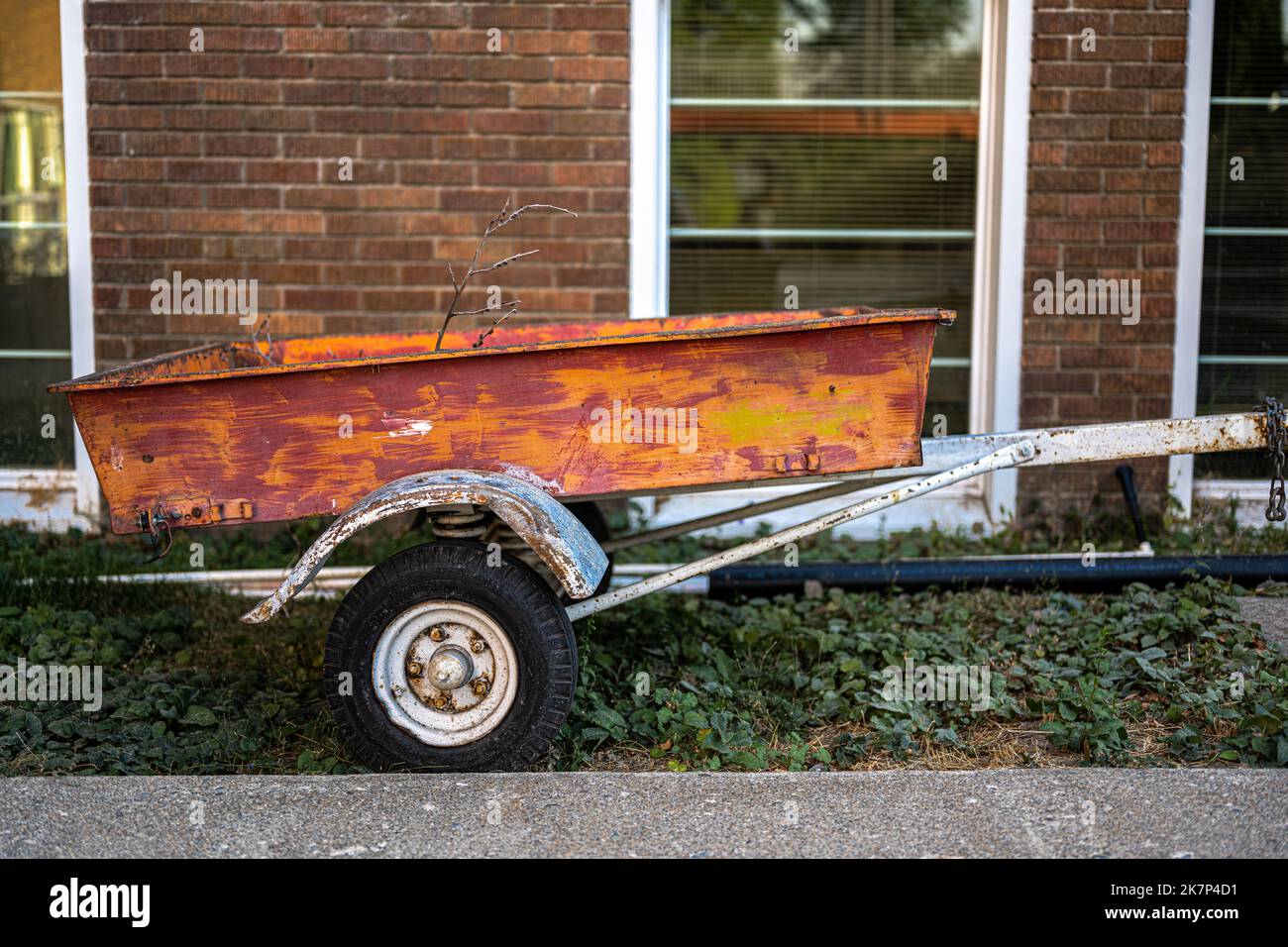 Old Trailer in Front of a House Stock Photo - Alamy