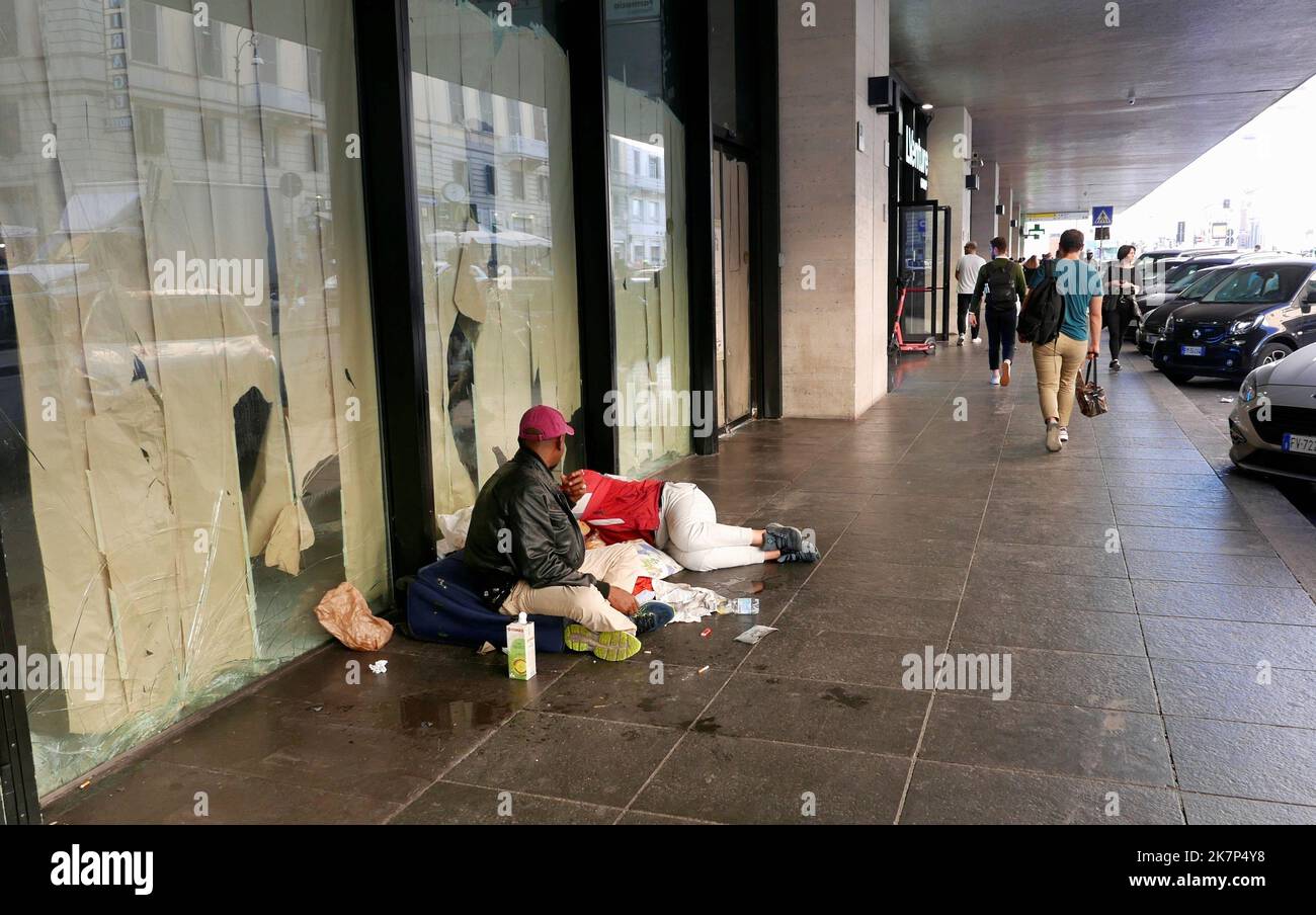 People lie down on a sidewalk in Rome, Italy, October 18 2022. The XXI ...