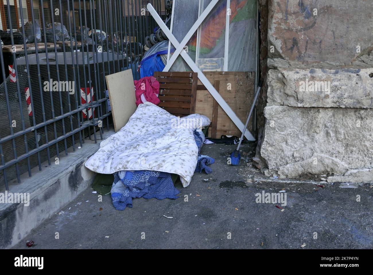 The bed of a homeless person is seen on a sidewalk in Rome, Italy ...