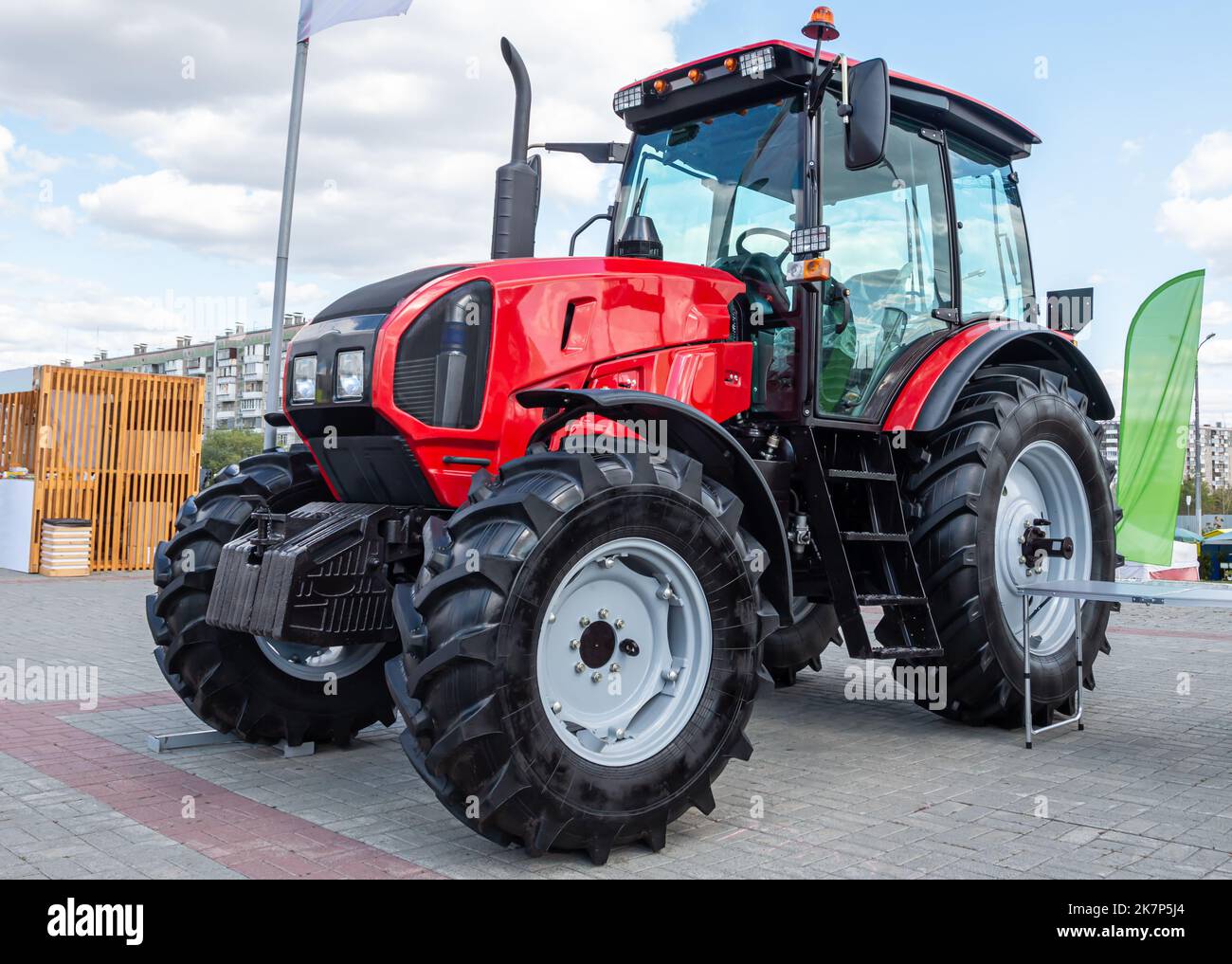 Red wheeled tractor at an agricultural fair Stock Photo - Alamy