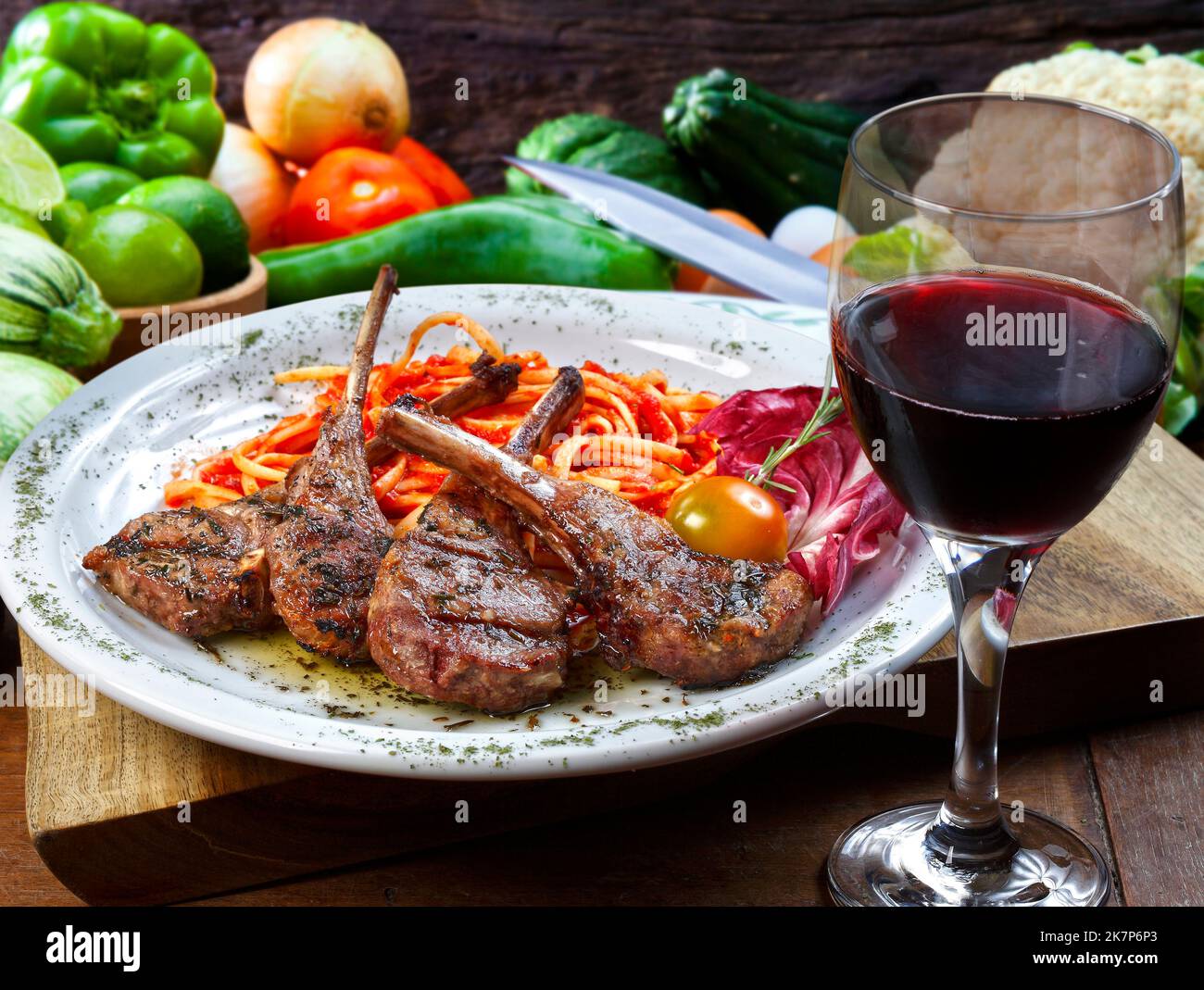 Lamb chops with pasta and red wine Stock Photo - Alamy
