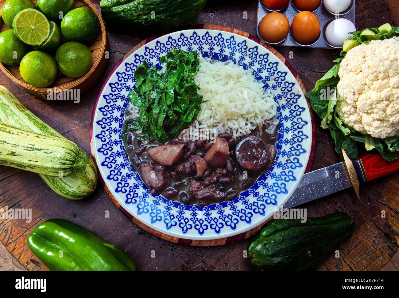 Traditional Brazilian feijoada with cabbage and rice Stock Photo - Alamy