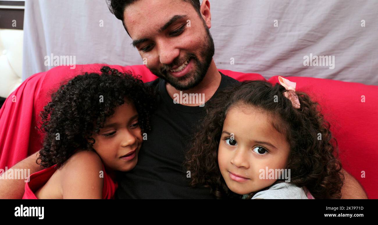 Latin people love and affection, daughters hugging father, hispanic ...