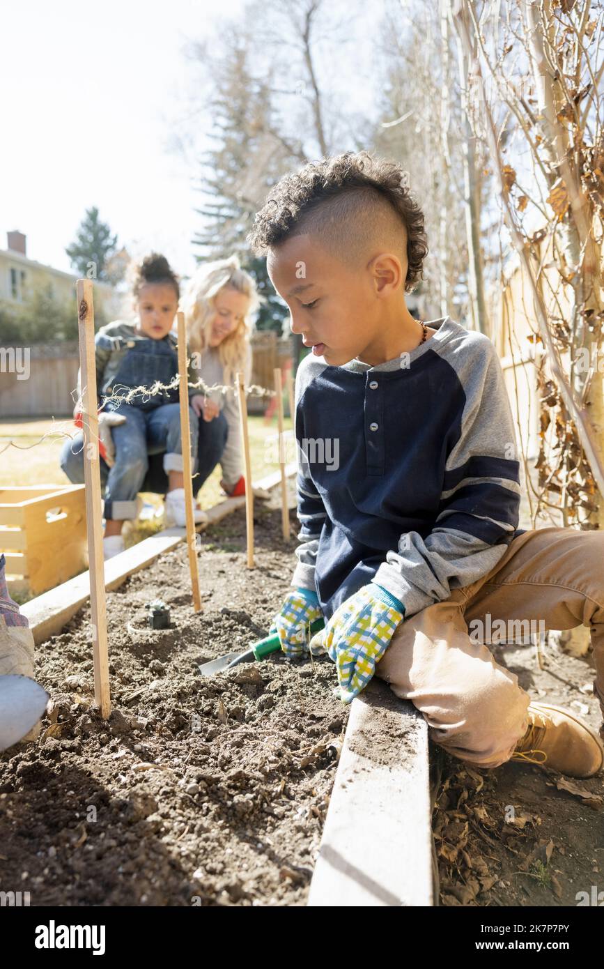 Children helping with project hi-res stock photography and images - Alamy